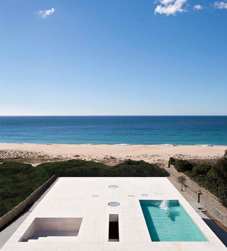 The House of the Infinite: A stone monolith with an incredible roof ...